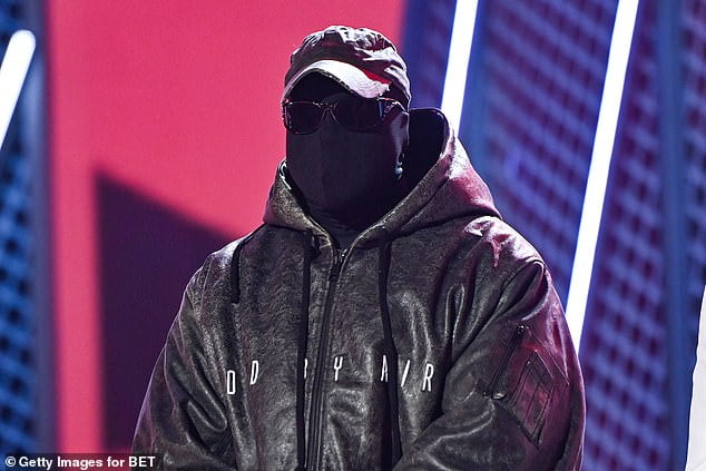 Kanye West Dons Full Face Covering As He Refers To Kim Kardashian At