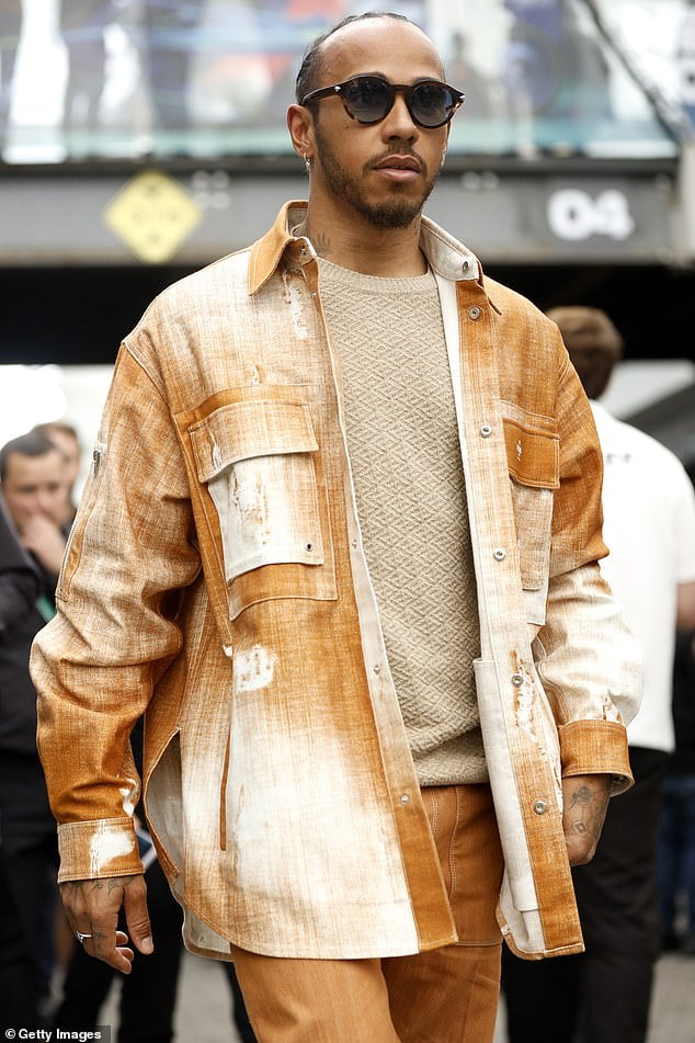 Lewis Hamilton showcases his impeccable style in an orange and white ...